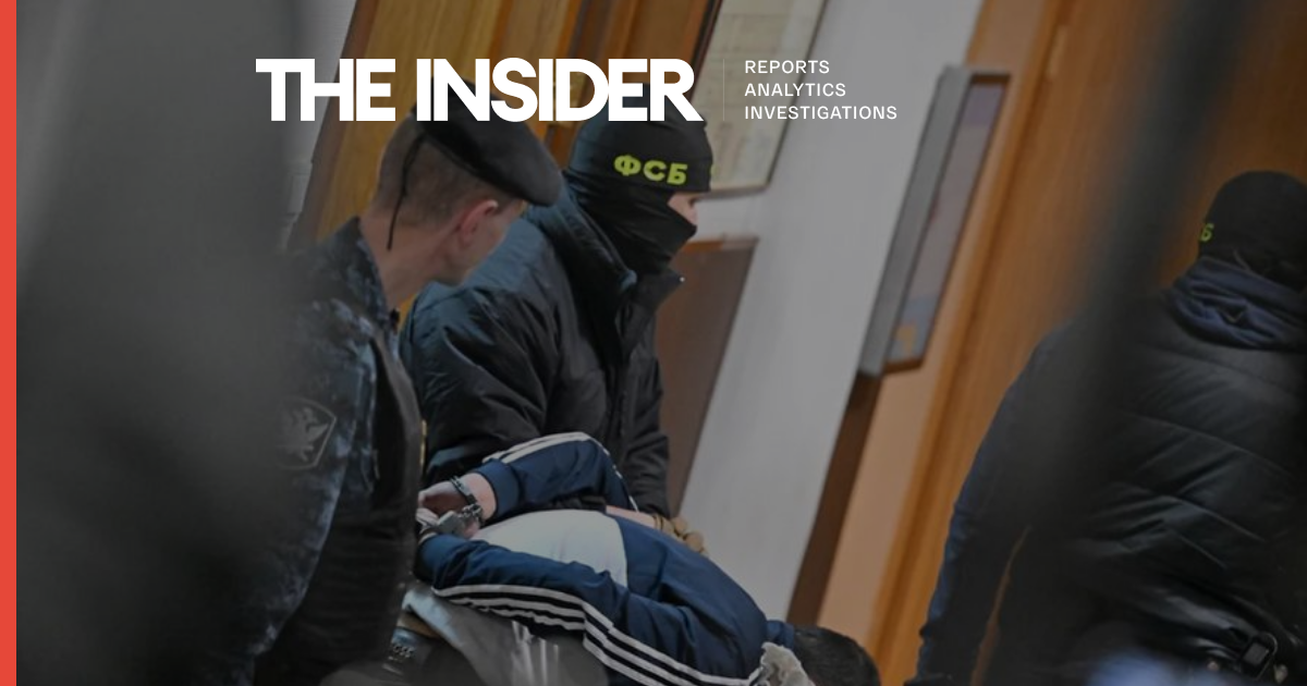 Four men with signs of severe beating charged with terrorism by Moscow ...